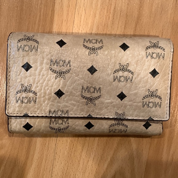 MCM | Bags | Mcm Monogram Trifold Wallet Reflects Mcms Heritage ...
